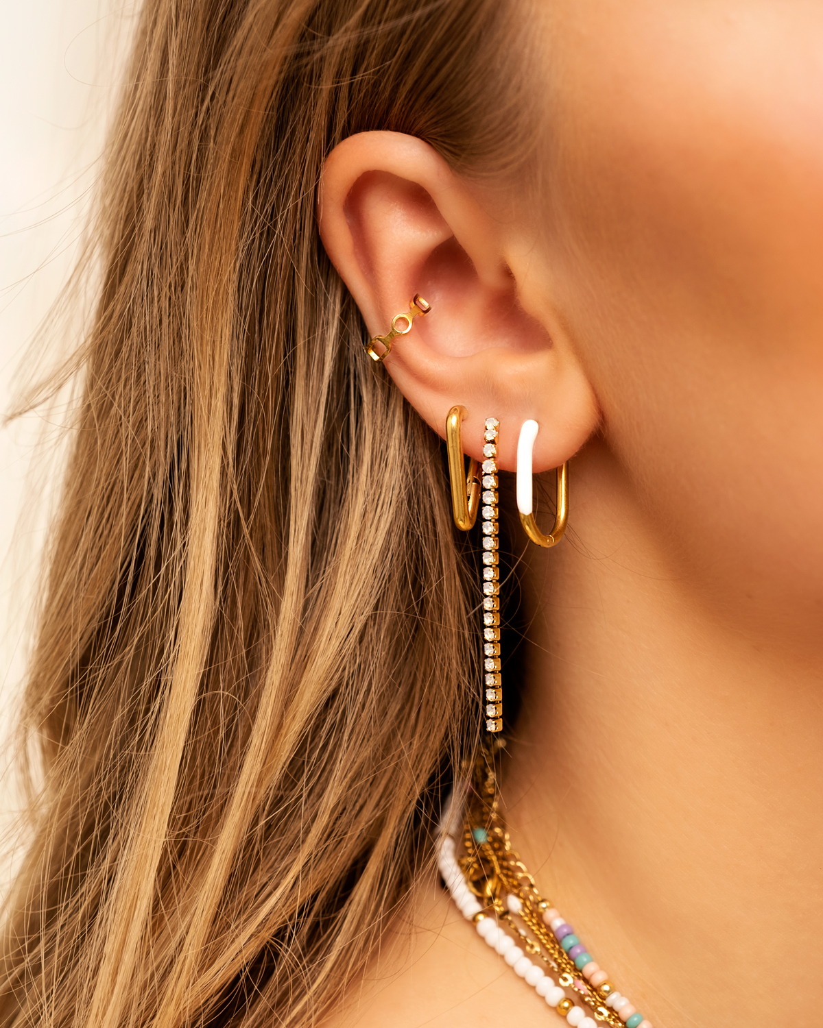 Ear cuff chain mix goud kleurig | Ear cuffs | Shop Finaste.nl